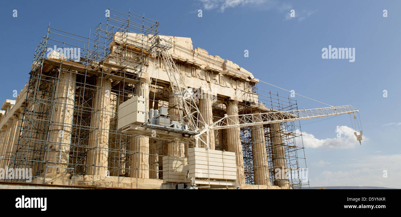 A scaffold and a crane are set up for restauration works at the Parthenon temple on the north ...