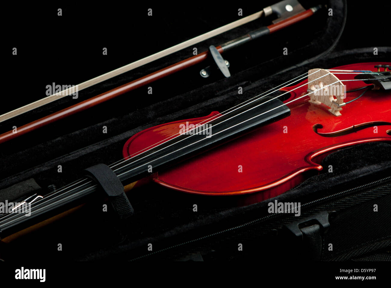 Violin and bow in black case Stock Photo - Alamy