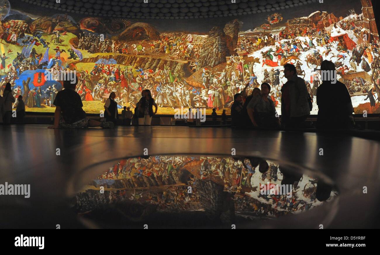 Visitors observe the monumental painting 'Peasants' War Panorama' of ...