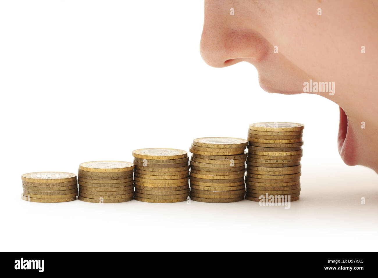 Woman eating money Stock Photo - Alamy