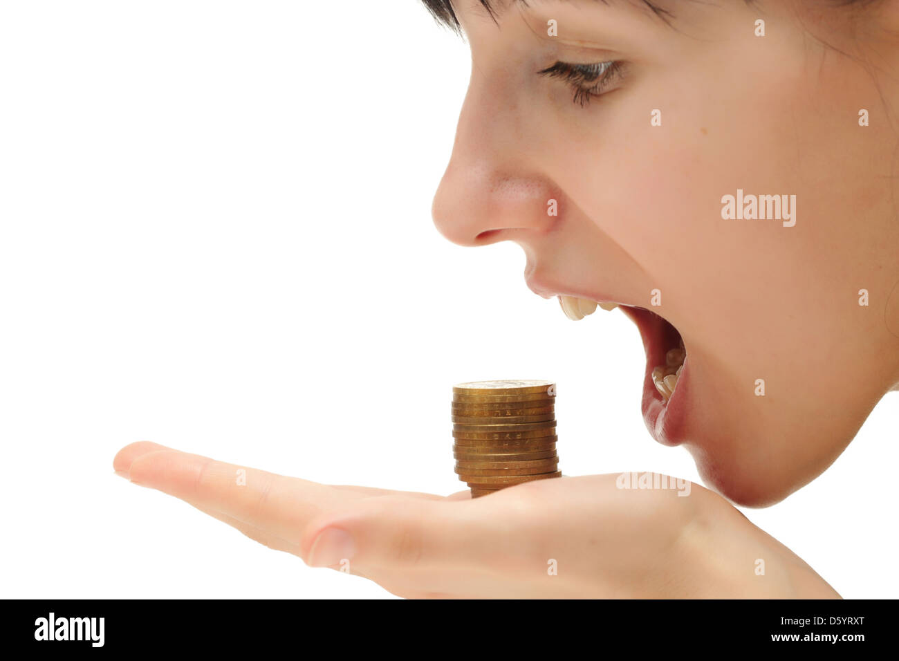Crisis concept - eating your money Stock Photo - Alamy