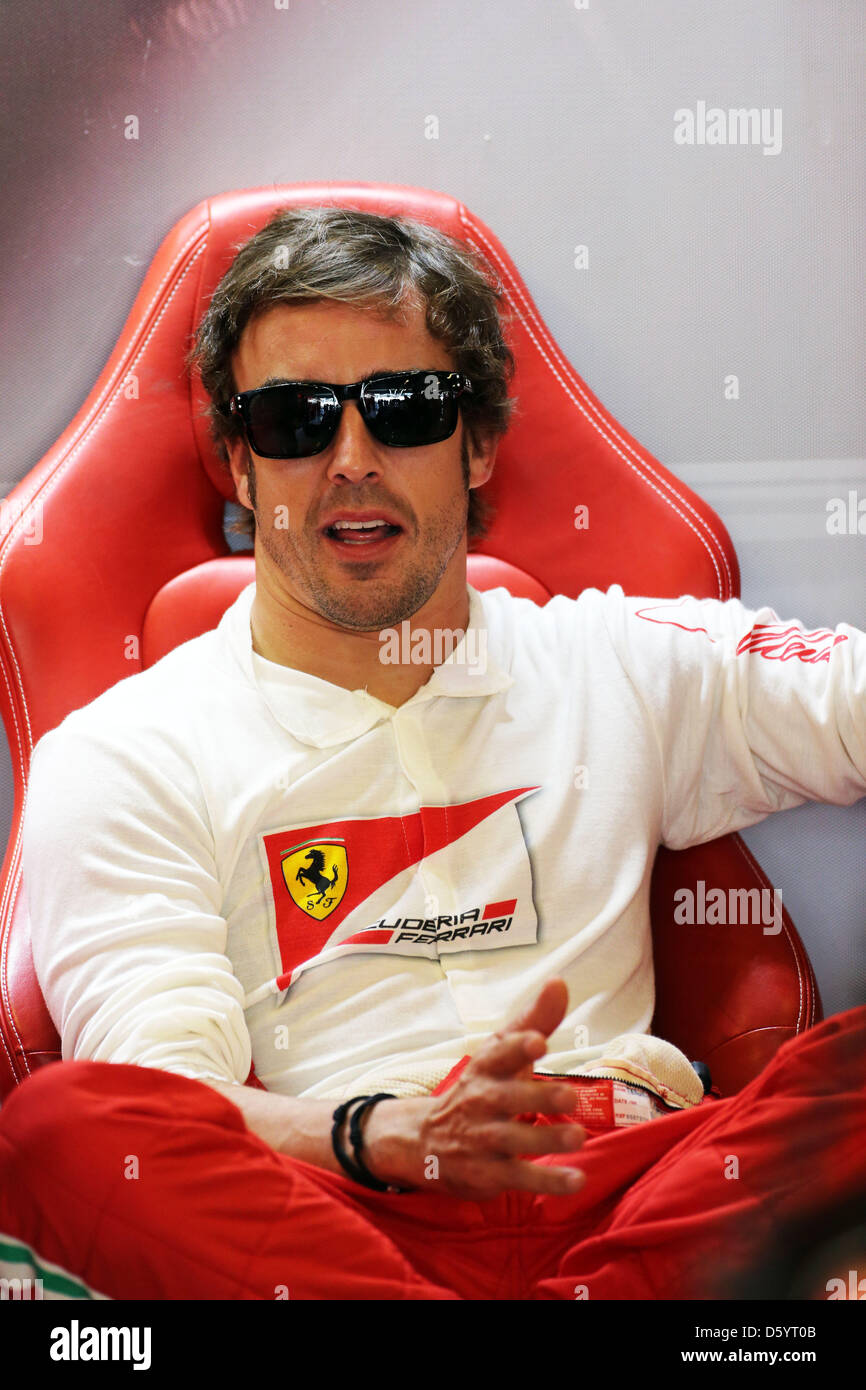 Spanish Formula One driver Fernando Alonso of Ferrari sits in the ...