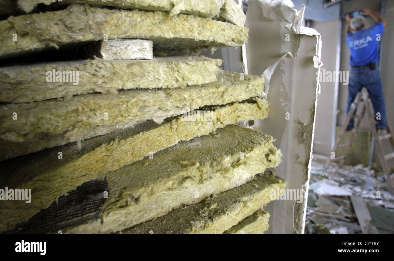 A file picture shows isolation materials in front of an old house ...