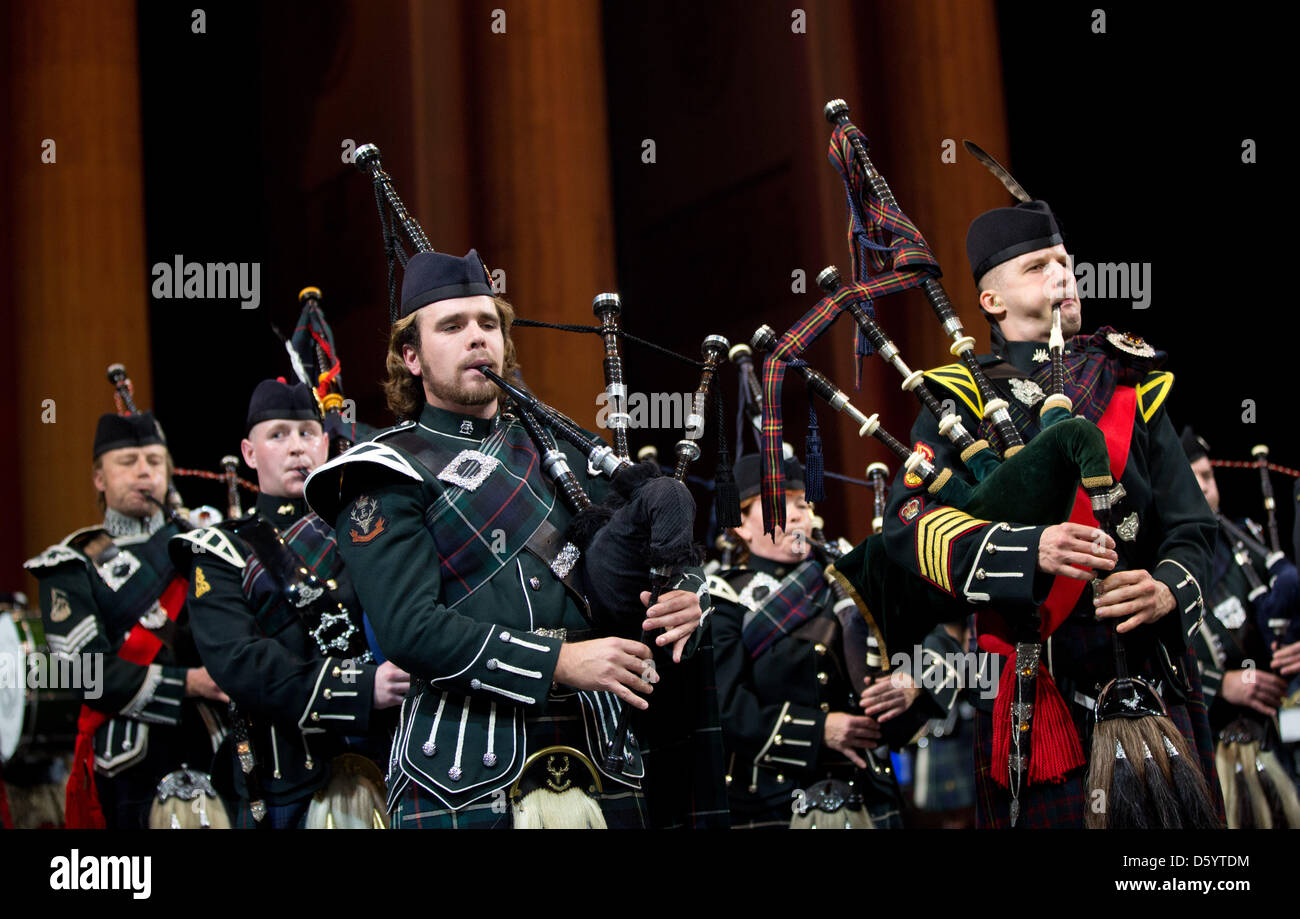 A pipe band from Scotlnad performs during a photo rehearsal of the ...