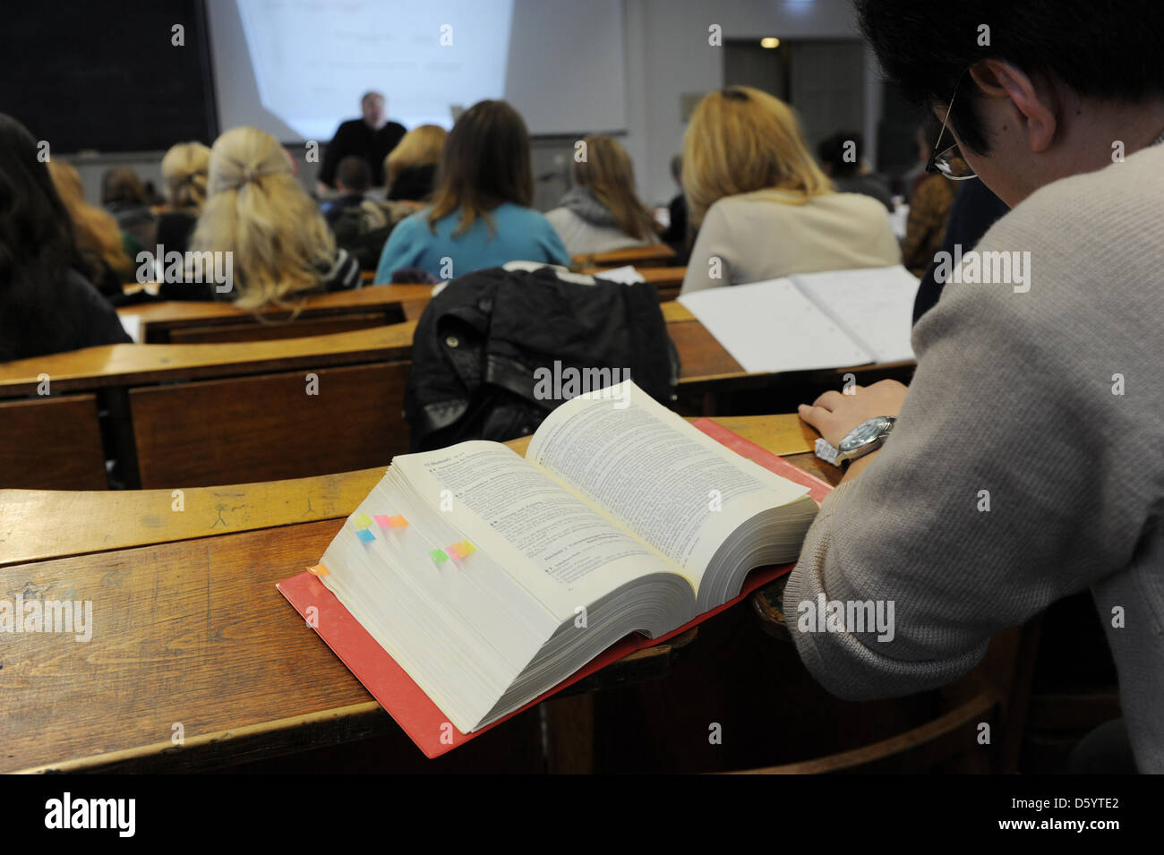 Students attend a lecture in the main building of Humboldt University ...