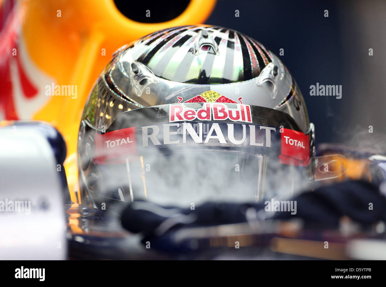 Cold air rises from the cockpit of German Formula One driver Sebastian ...
