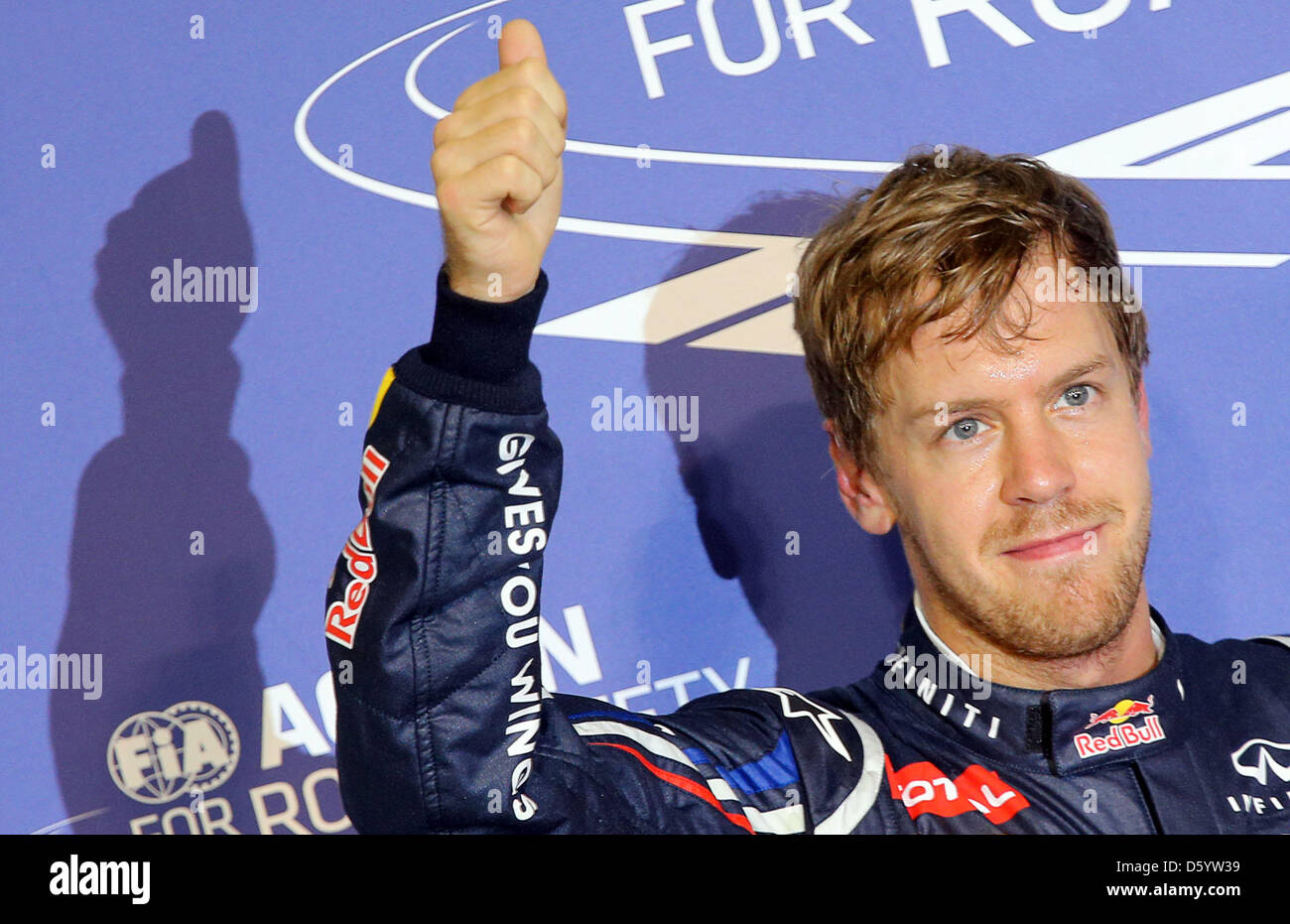 German Formula One driver Sebastian Vettel of Red Bull reacts after his ...
