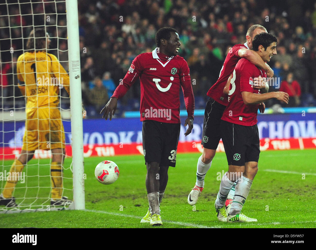 Hanover's Lars Stindl (r) cheers after his 2-0 goal with Mame Diouf (2 ...
