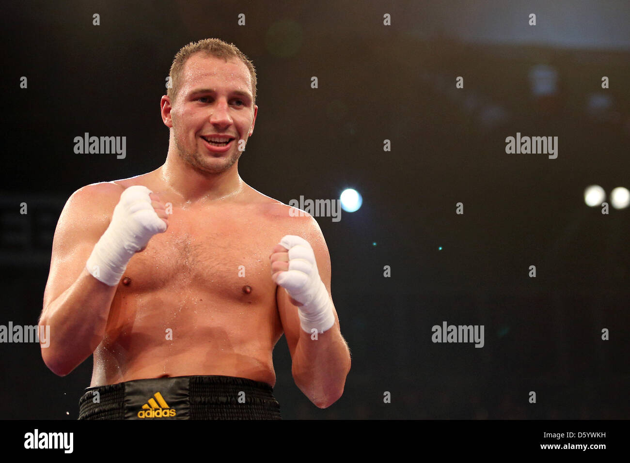 German boxer Enrico Koelling cheers after winning the fight against ...