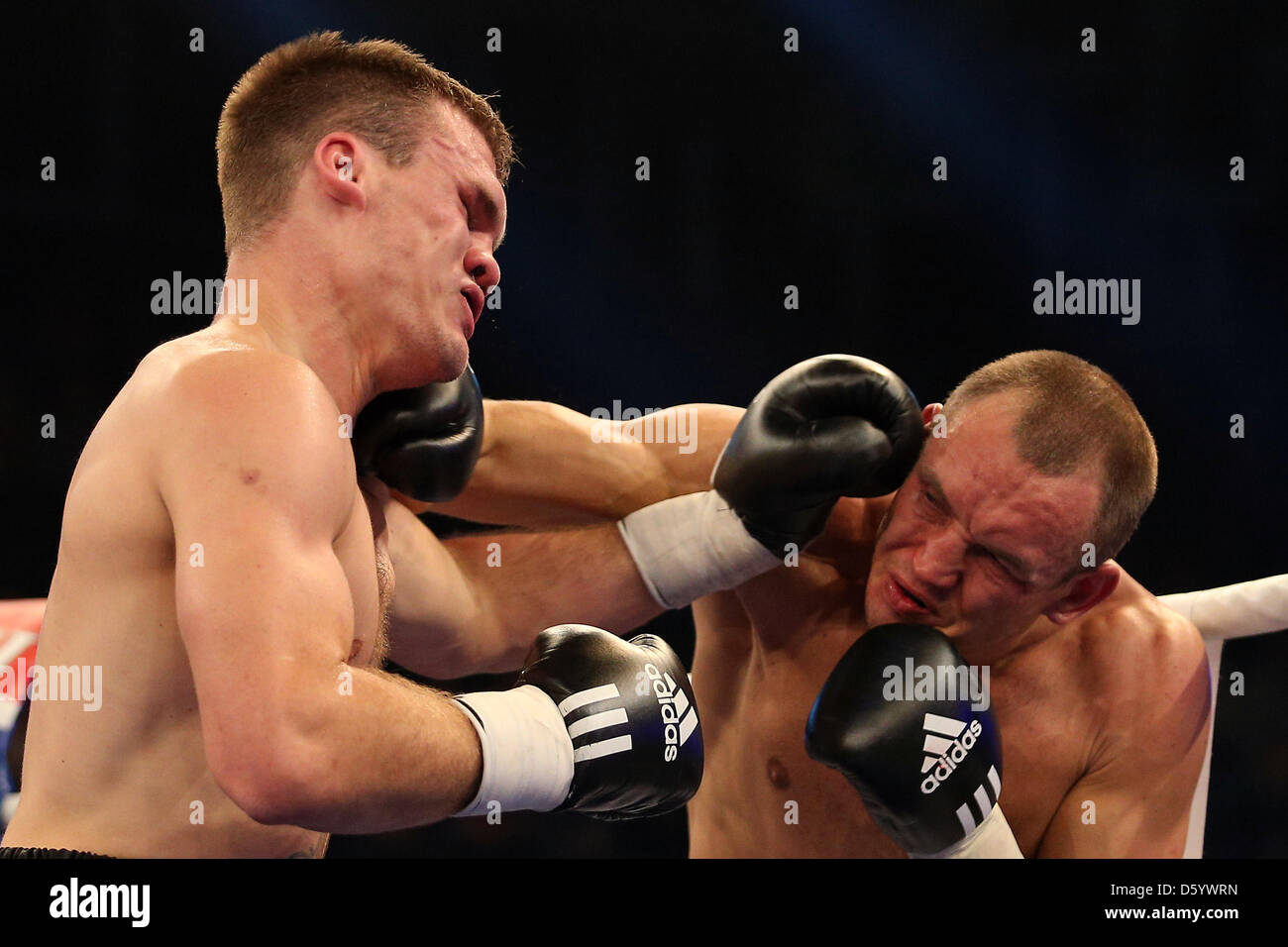 Italian light heavyweight boxer Serhiy Demchenko (R) fights against ...