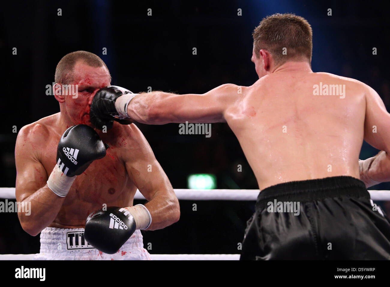 Italian light heavyweight boxer Serhiy Demchenko (L) fights against ...