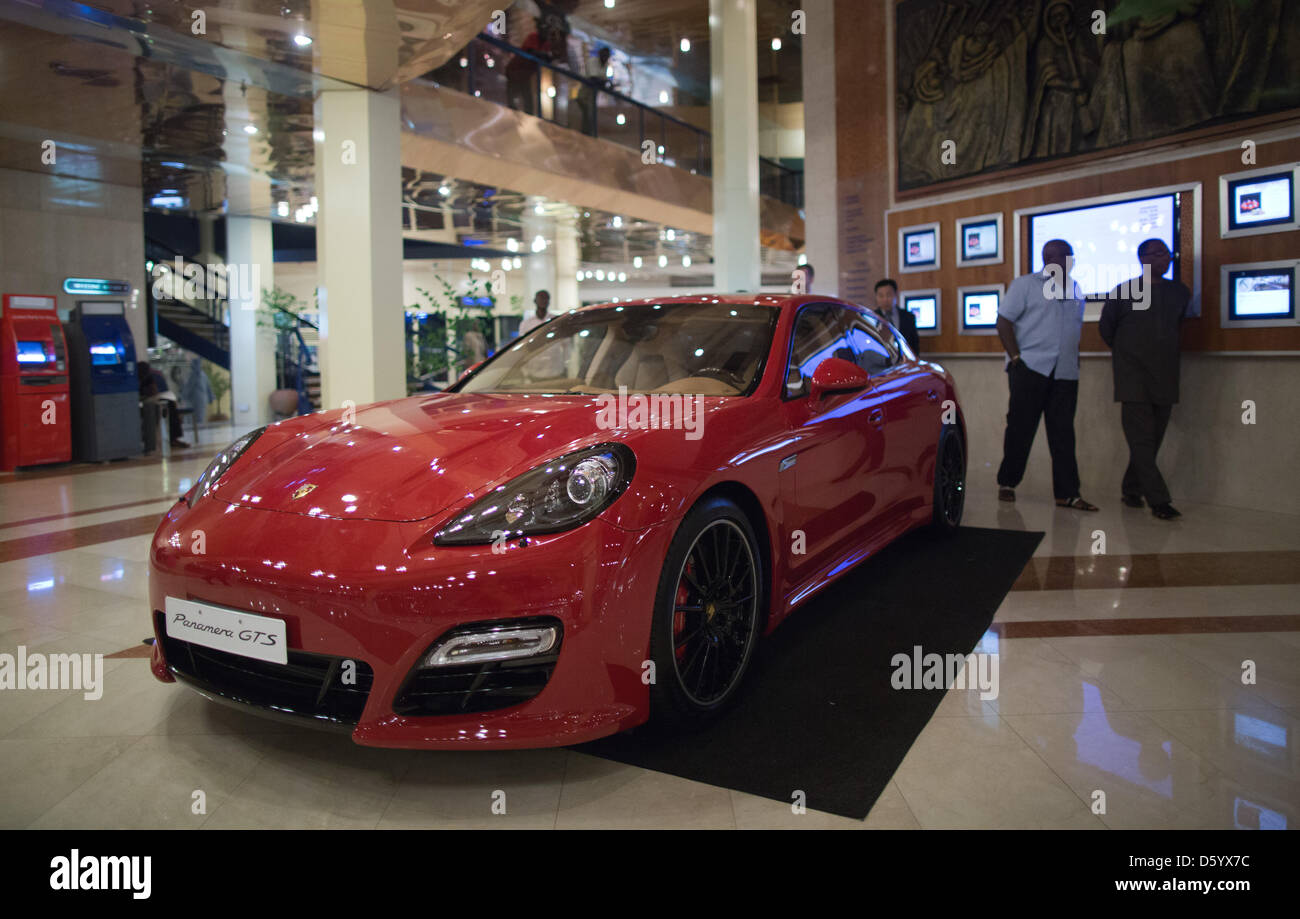 A Porsche Panamera is visible at the lobby of the hotel Transcorp ...