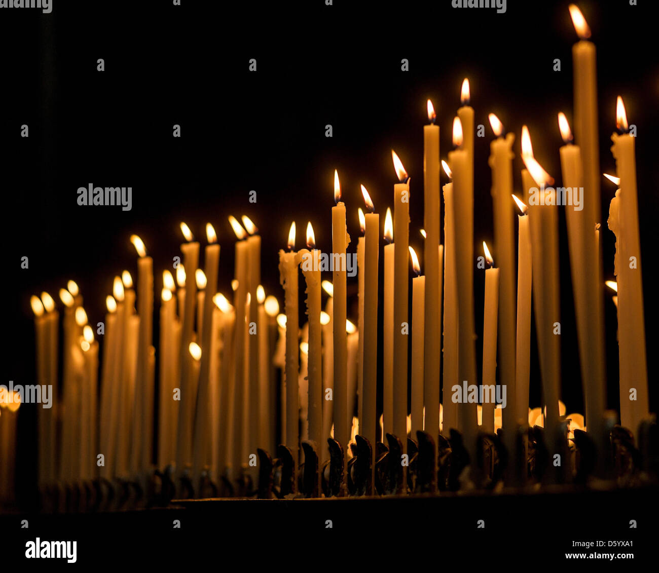 Burning candles in the Cathedral of Milan, Italy Stock Photo - Alamy