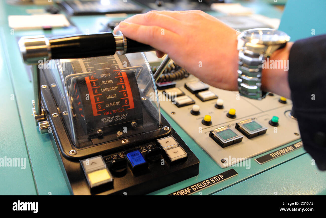 A recruit pushes a lever at the corvette 'Braunschweig' at the naval ...