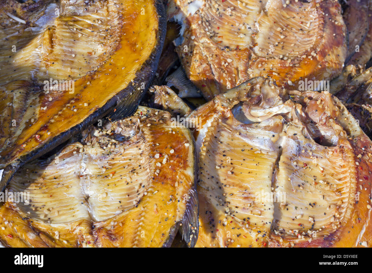Golden brown fish hi-res stock photography and images - Alamy
