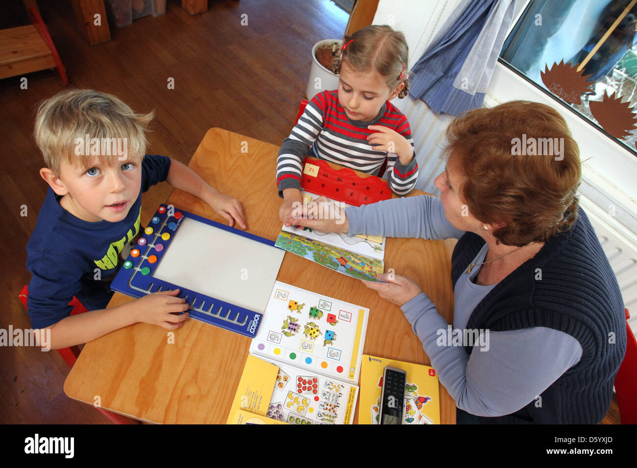 Children learn from kindergarten teacher Florence Landry at the ...