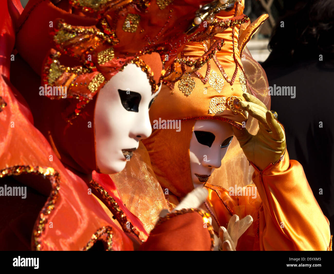 Woman with red carnival mask in Venice Stock Photo - Alamy