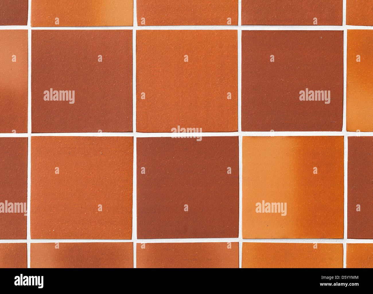 Red square tile on the wall Stock Photo - Alamy