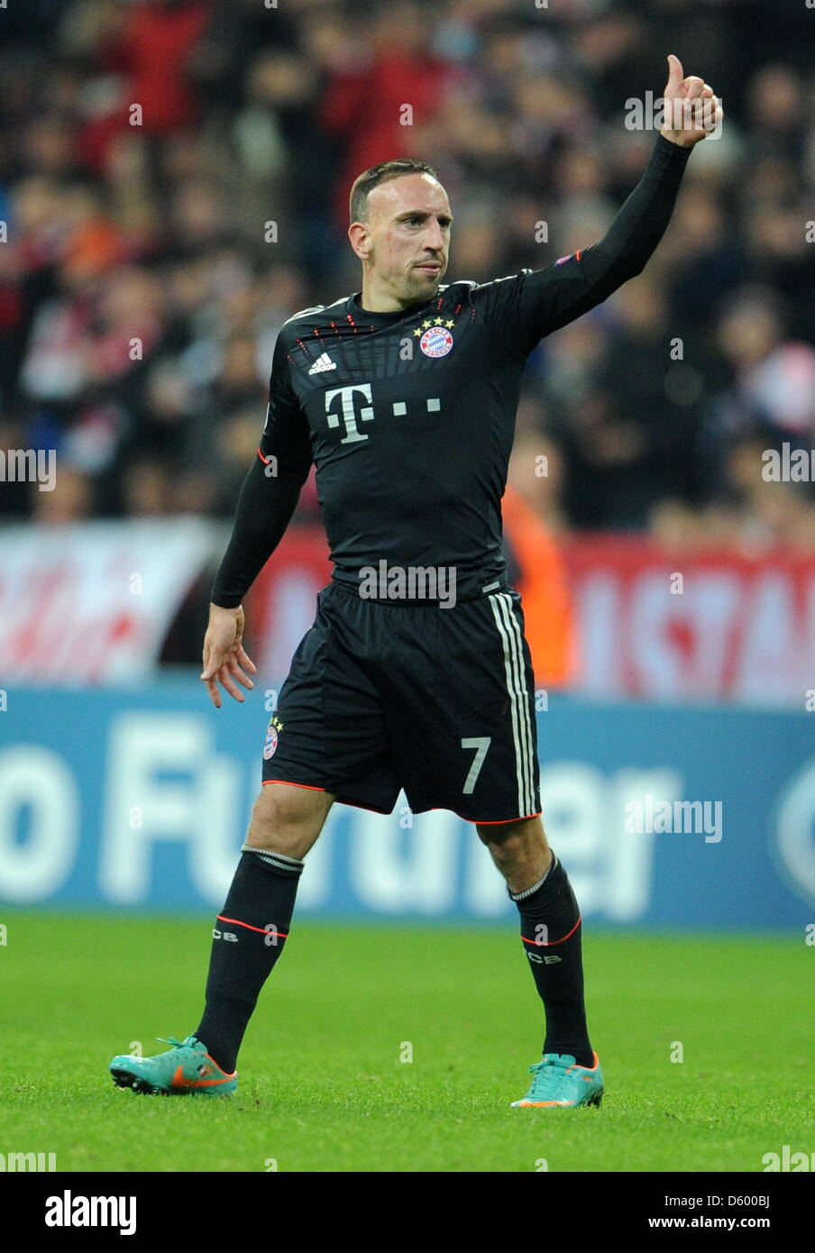 Munich's Franck Ribéry is holding his hand up during the Champions ...