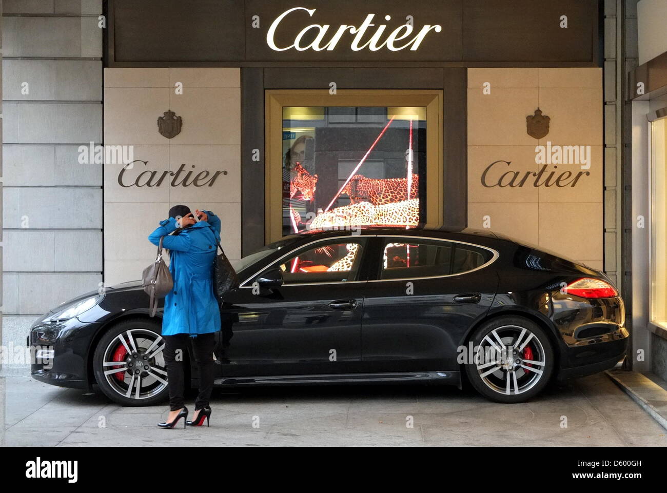 A Porsche Panamera is pictured before a Cartier branch store in Zurich ...
