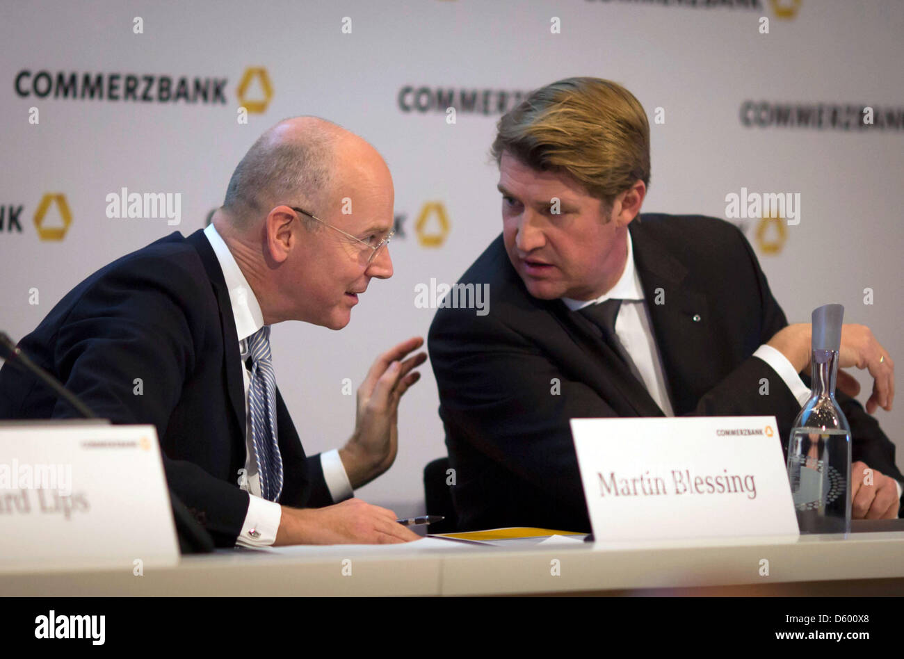 CEO of Commerzbank Martin Blessing (R) talks with board member Jochen ...