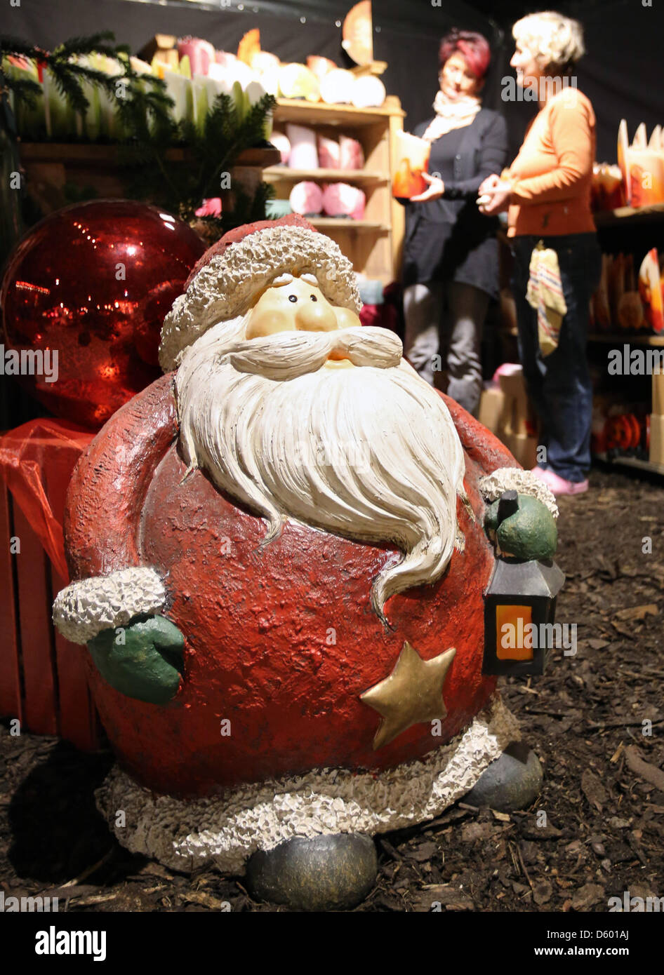 A large Santa Claus figure stands in the Christmas barn at Karls ...