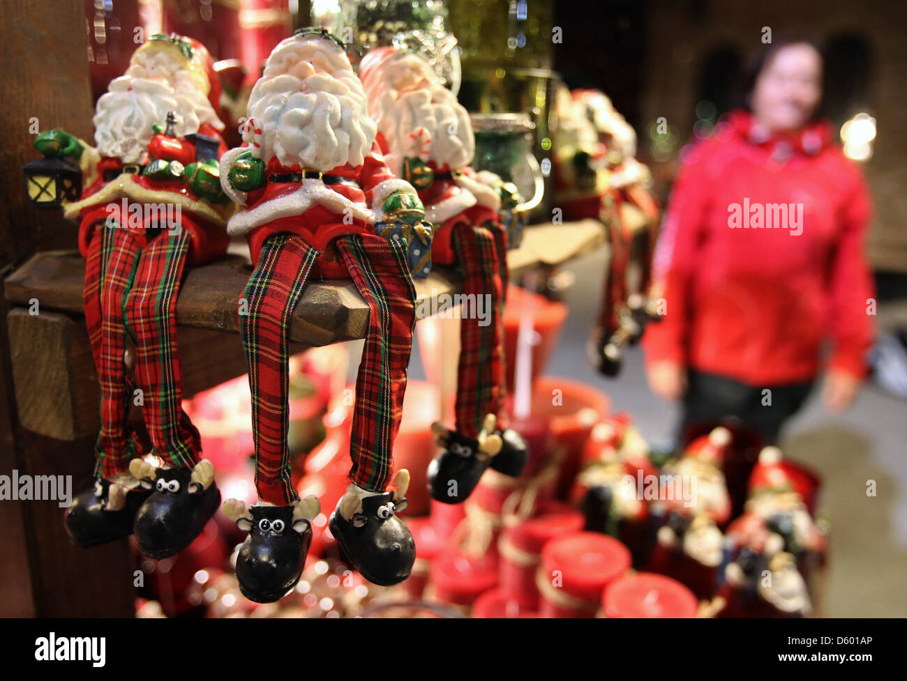 Santa Claus figures wait to be purchased in the Christmas barn at Karls ...