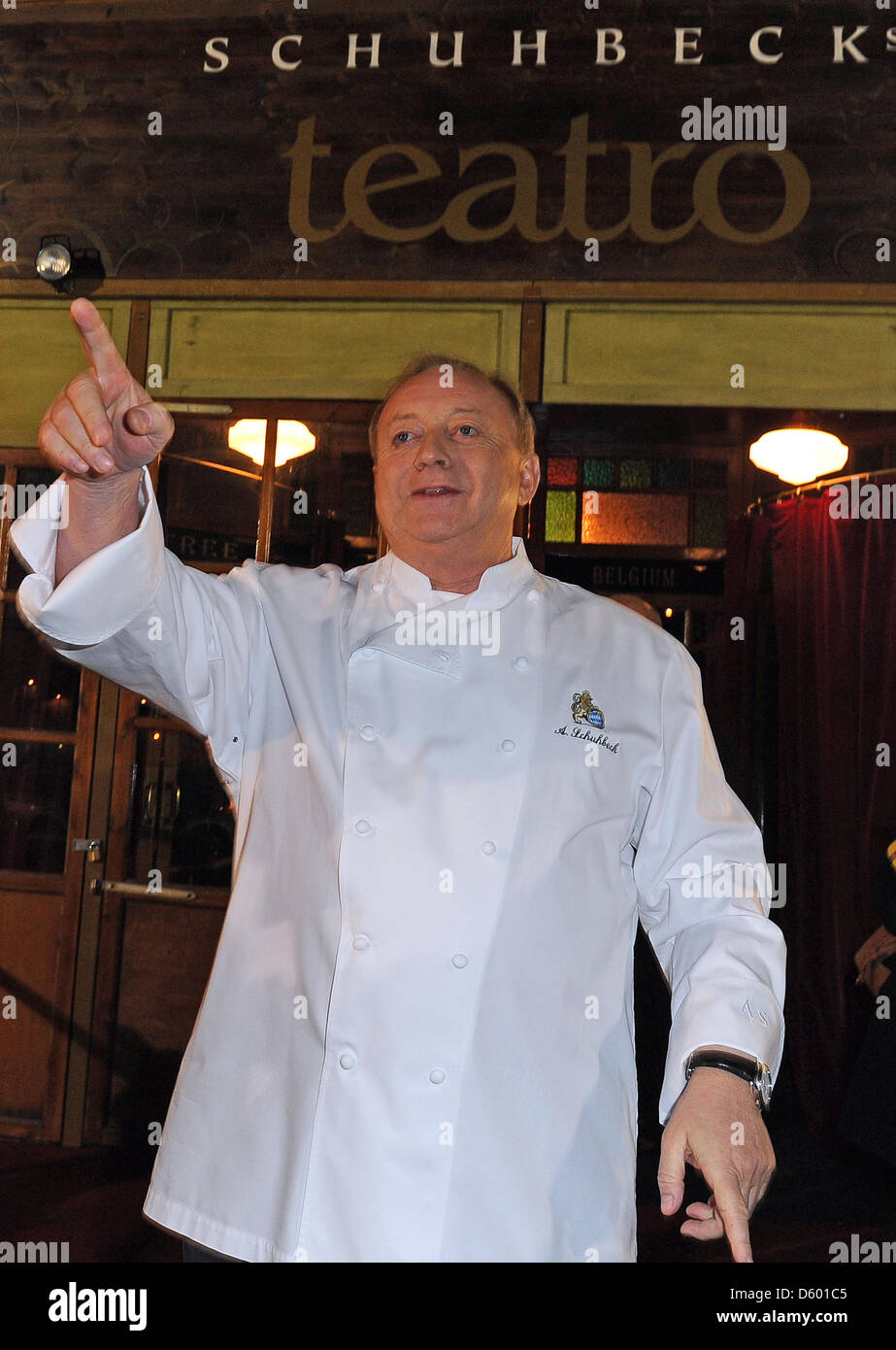 Star chef Alfons Schuhbeck poses for the camera in front of his the ...