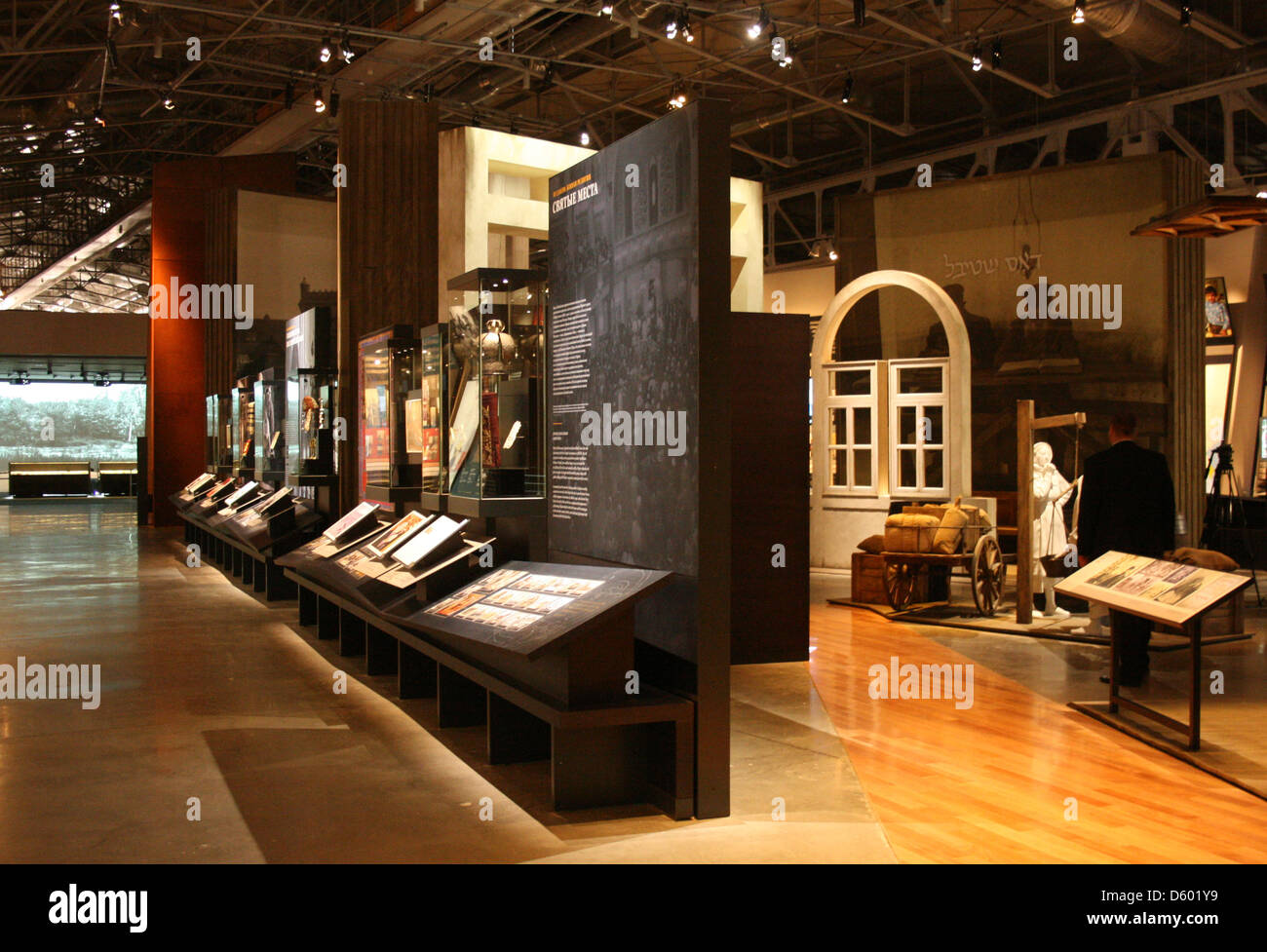 A visitor stands in the newly opened Jewish Museum in Moscow, Russia ...