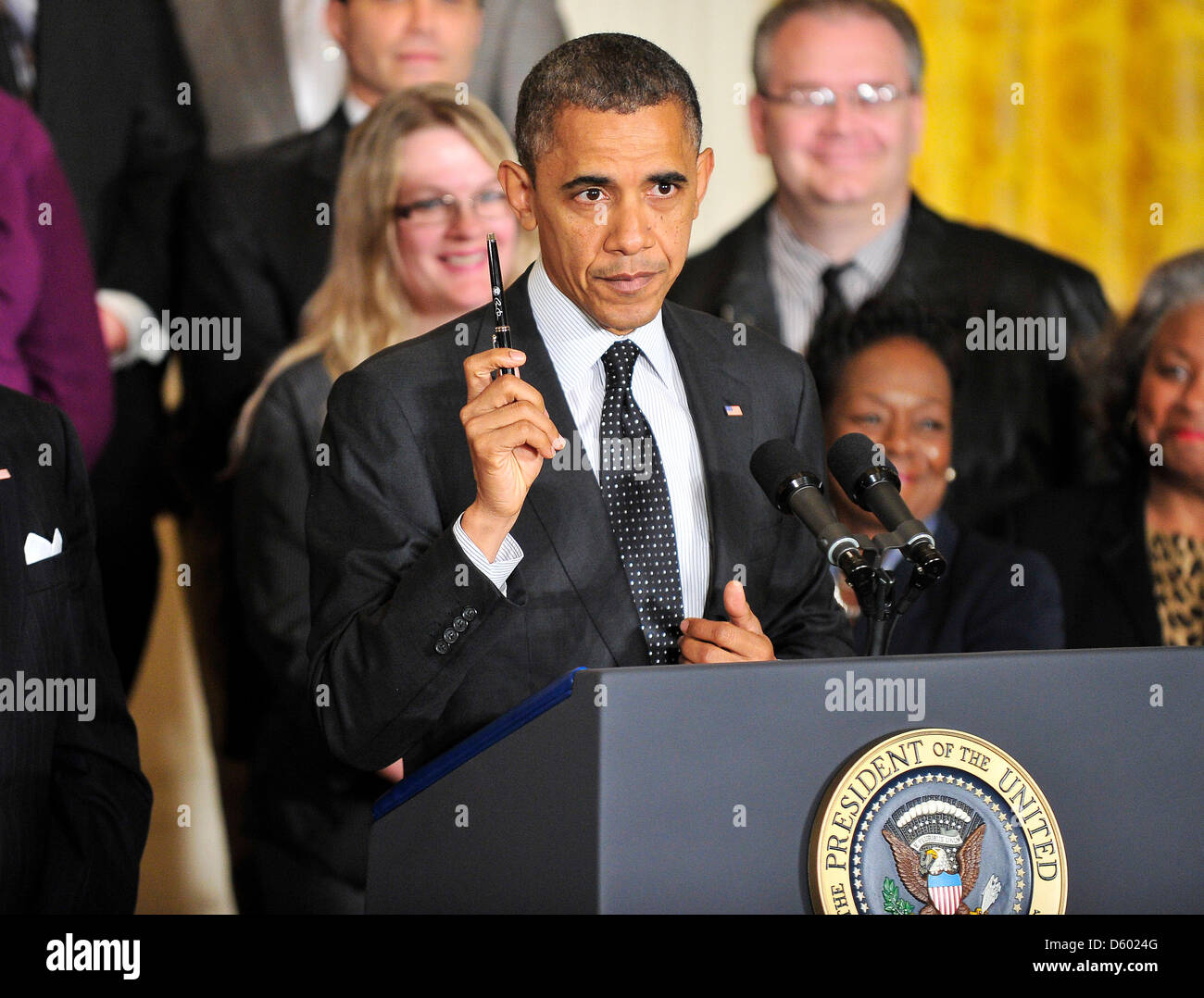 United States President Barack Obama shows "the pen ready to sign the ...