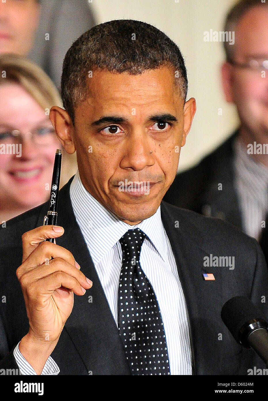 United States President Barack Obama shows "the pen ready to sign the ...