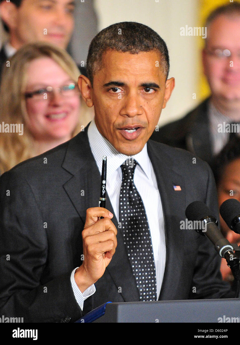 United States President Barack Obama shows "the pen ready to sign the ...
