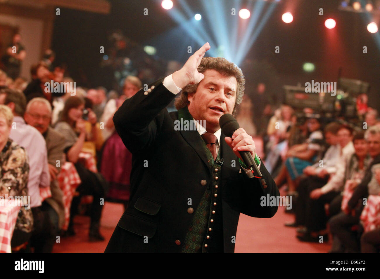 Singer and moderator Andy Borg is pictured on stage during the dress ...