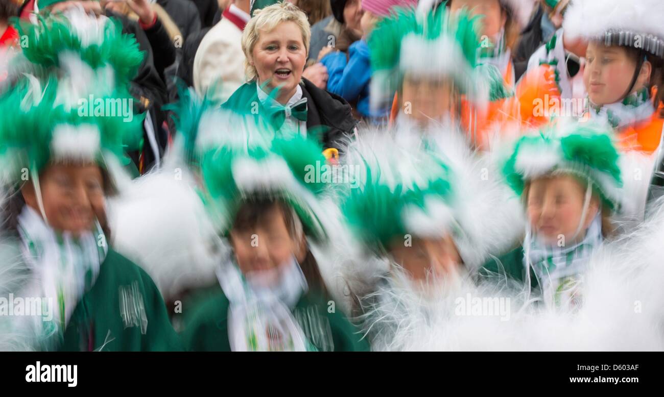 Young female members of a carnival association dance in front of the ...