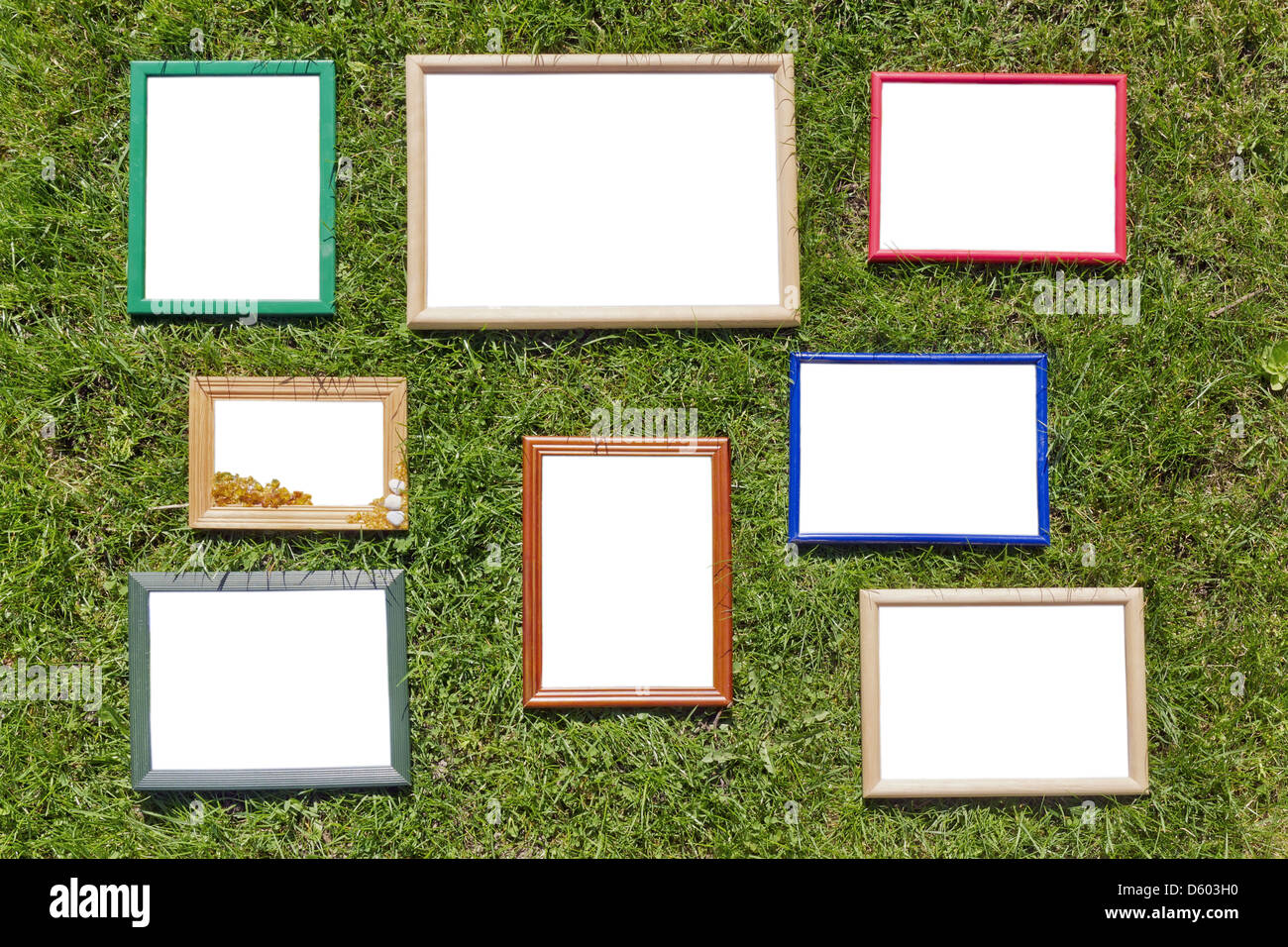 Wooden photo frames on spring lawn Stock Photo - Alamy
