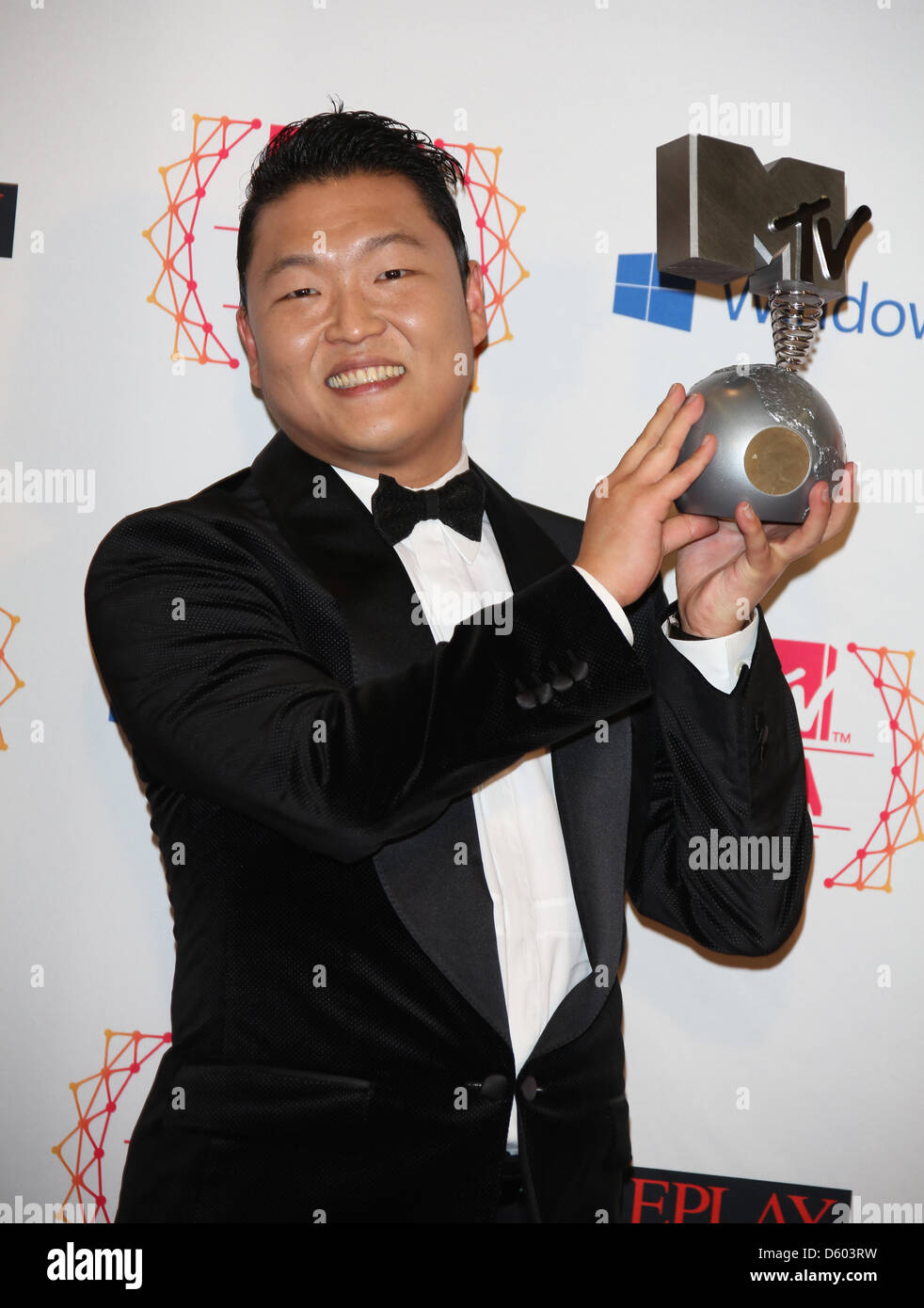 South Korean pop star Psy poses in the press room of the MTV Europe ...