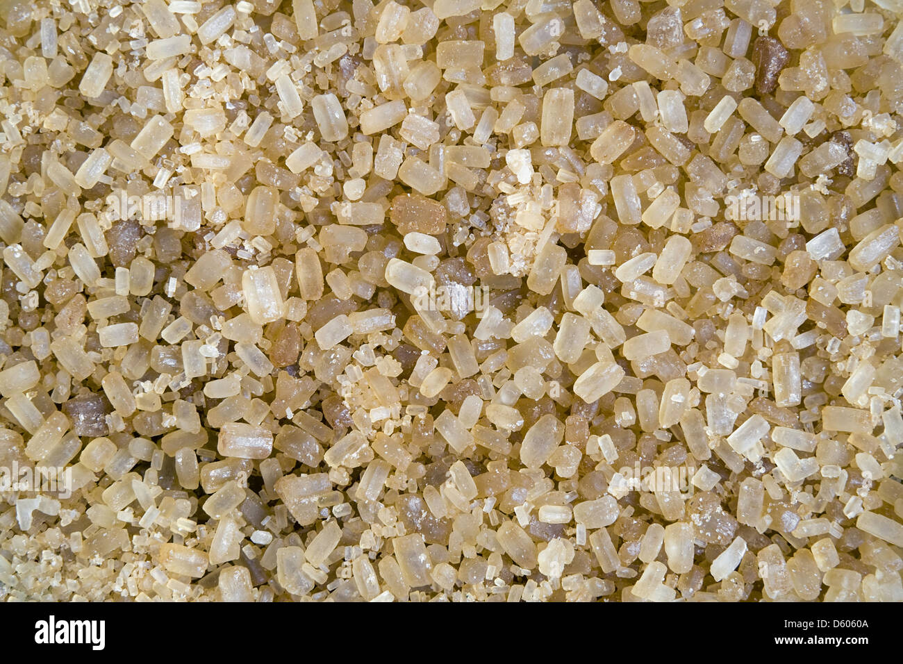 Yellow crystals of cane sugar Stock Photo - Alamy