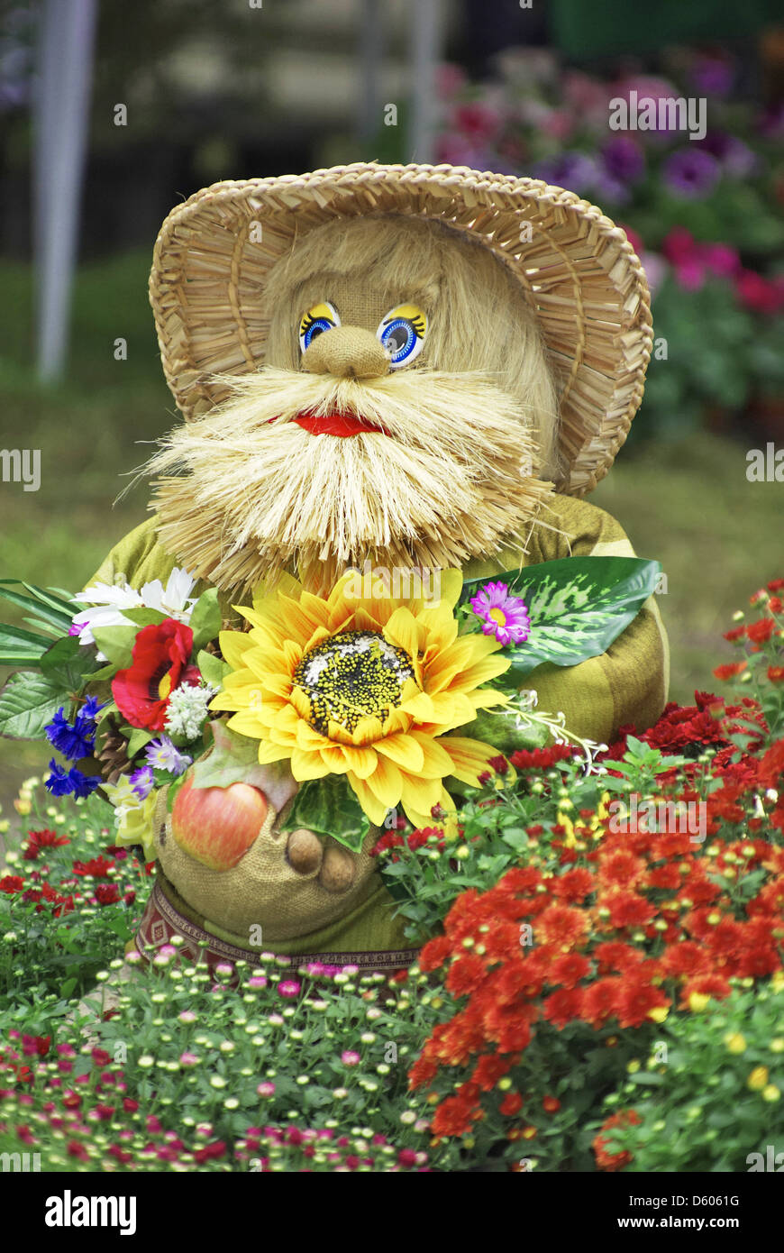 Garden flowers doll Stock Photo - Alamy