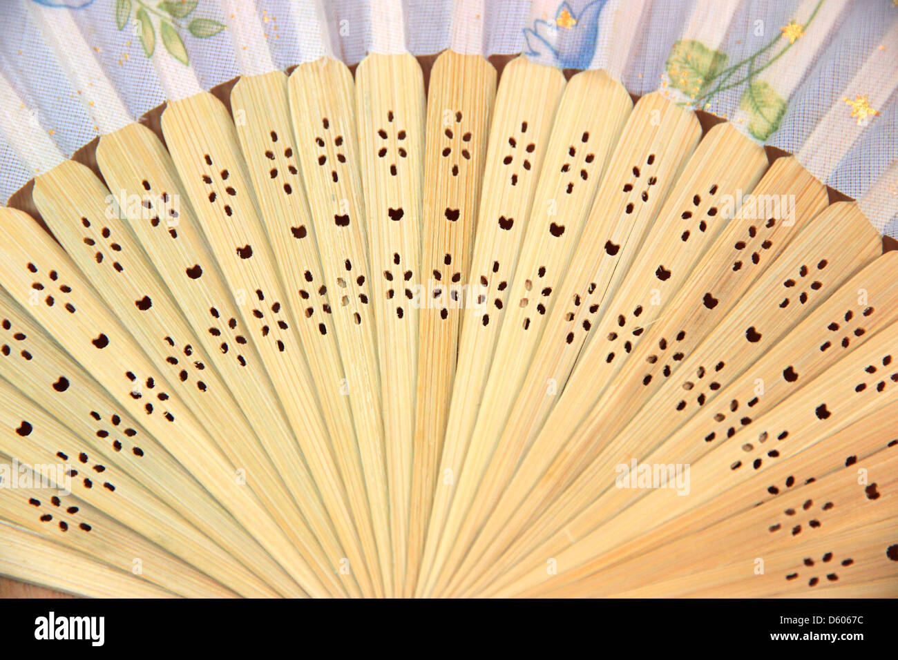 A Chinese fan flower pattern pink color made of woods Stock Photo - Alamy