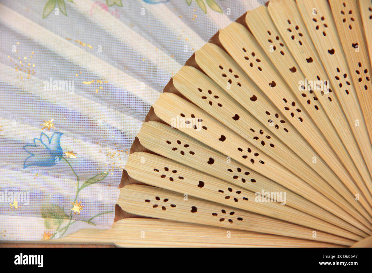 A Chinese fan flower pattern pink color made of woods Stock Photo - Alamy