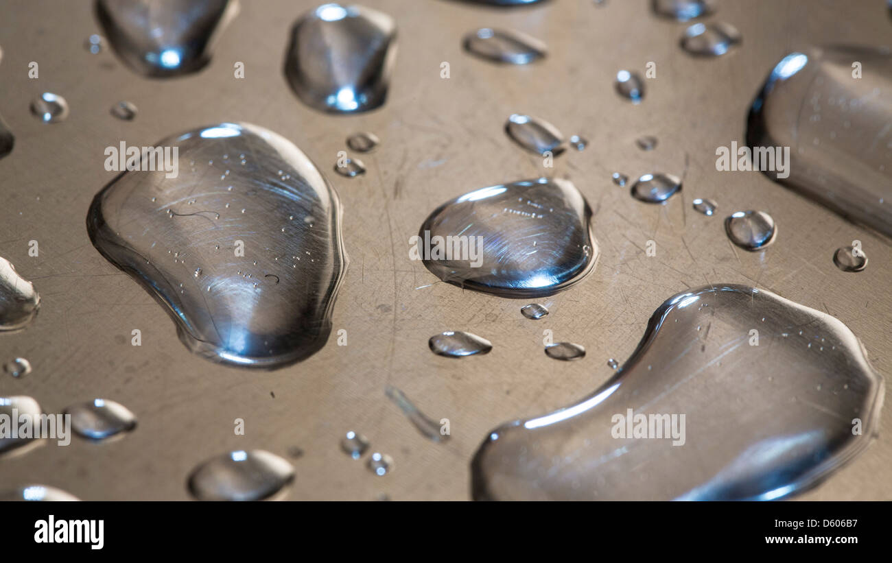 Water drops on a metal surface Stock Photo - Alamy