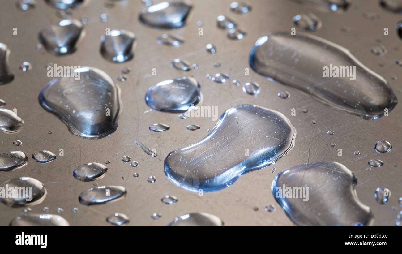 Water drops on a metal surface Stock Photo - Alamy