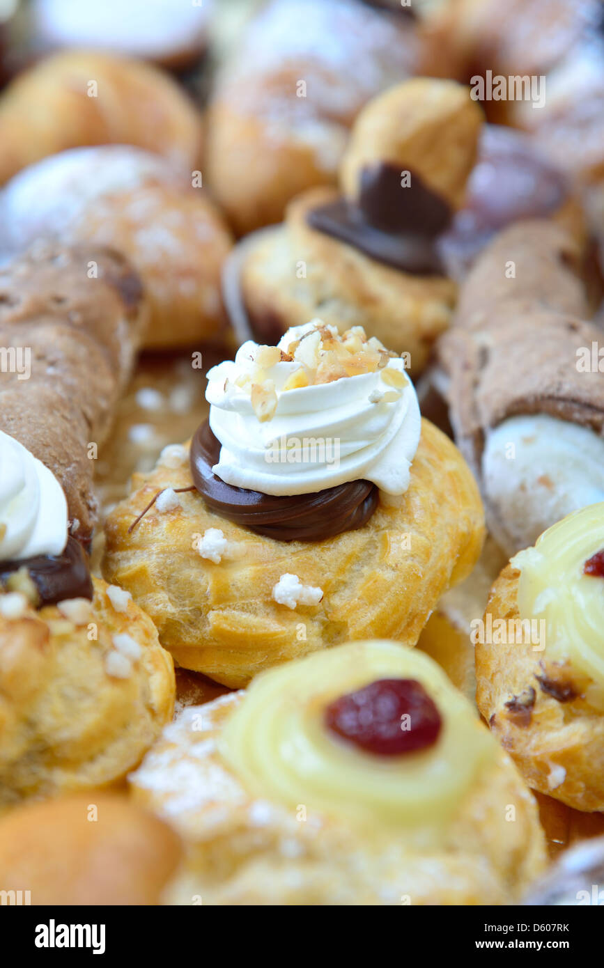 small cakes mixed with cream Stock Photo - Alamy