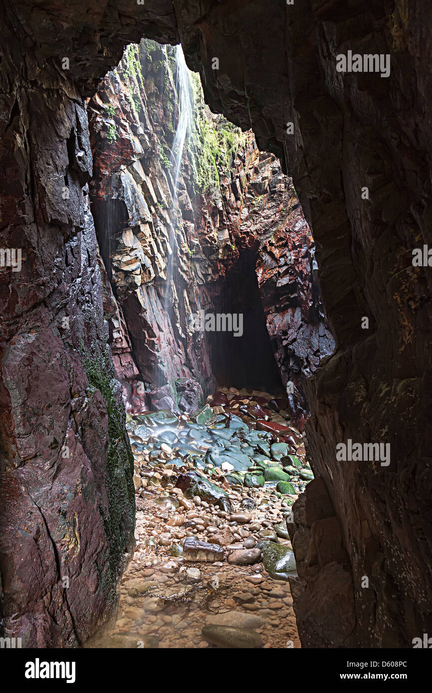 Waterfall cave at plemont beach, jersey hi-res stock photography and ...