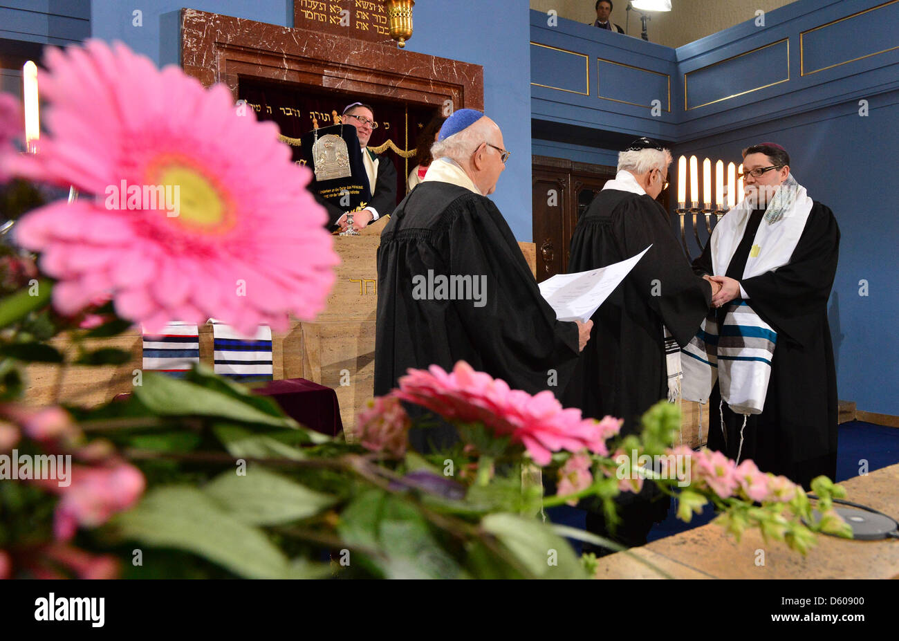 New cantor Nikola David (R) is ordained during a ceremony at the New ...