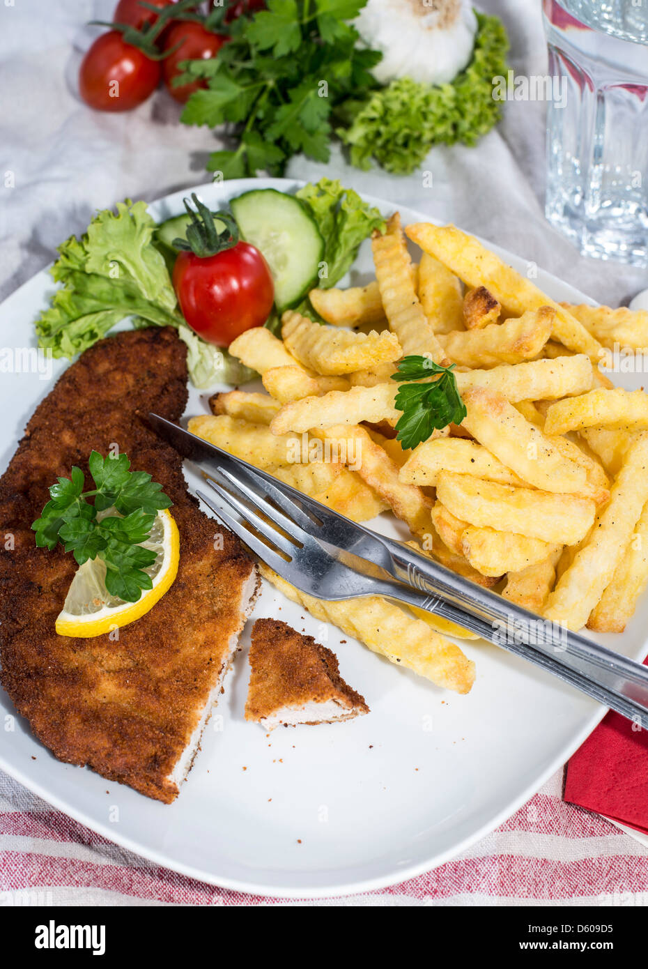Wiener schnitzel with french fries on a plate hi-res stock photography ...