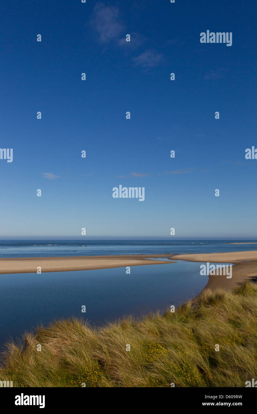 Landscape view of coastal sand dunes, saltwater lagoon and Irish Seam ...