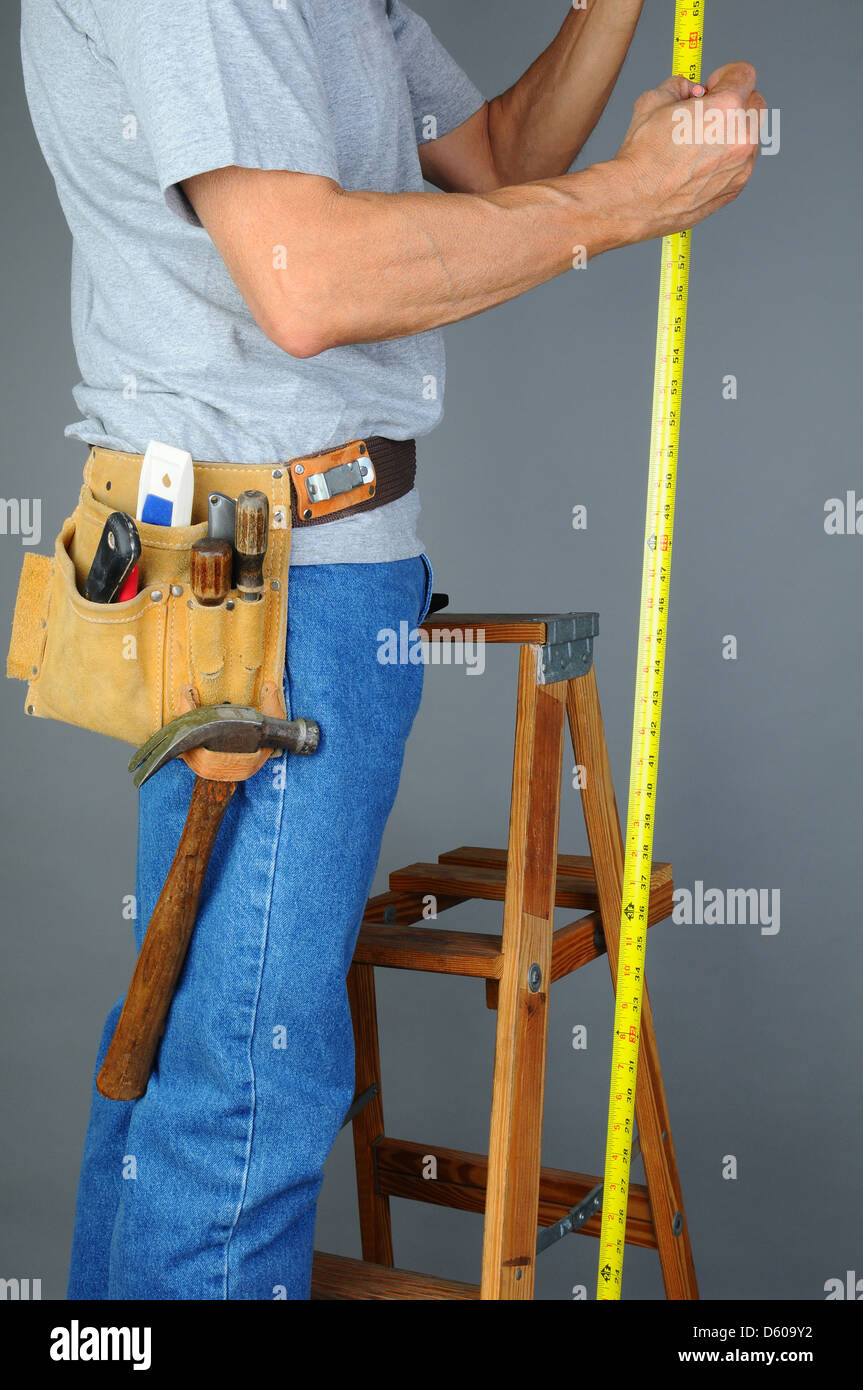 Man standing on ladder hi-res stock photography and images - Alamy