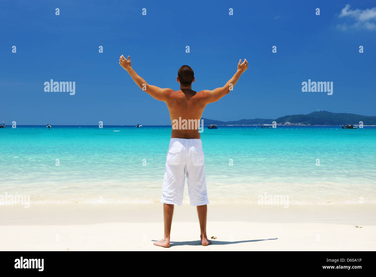 Man at beach Stock Photo - Alamy