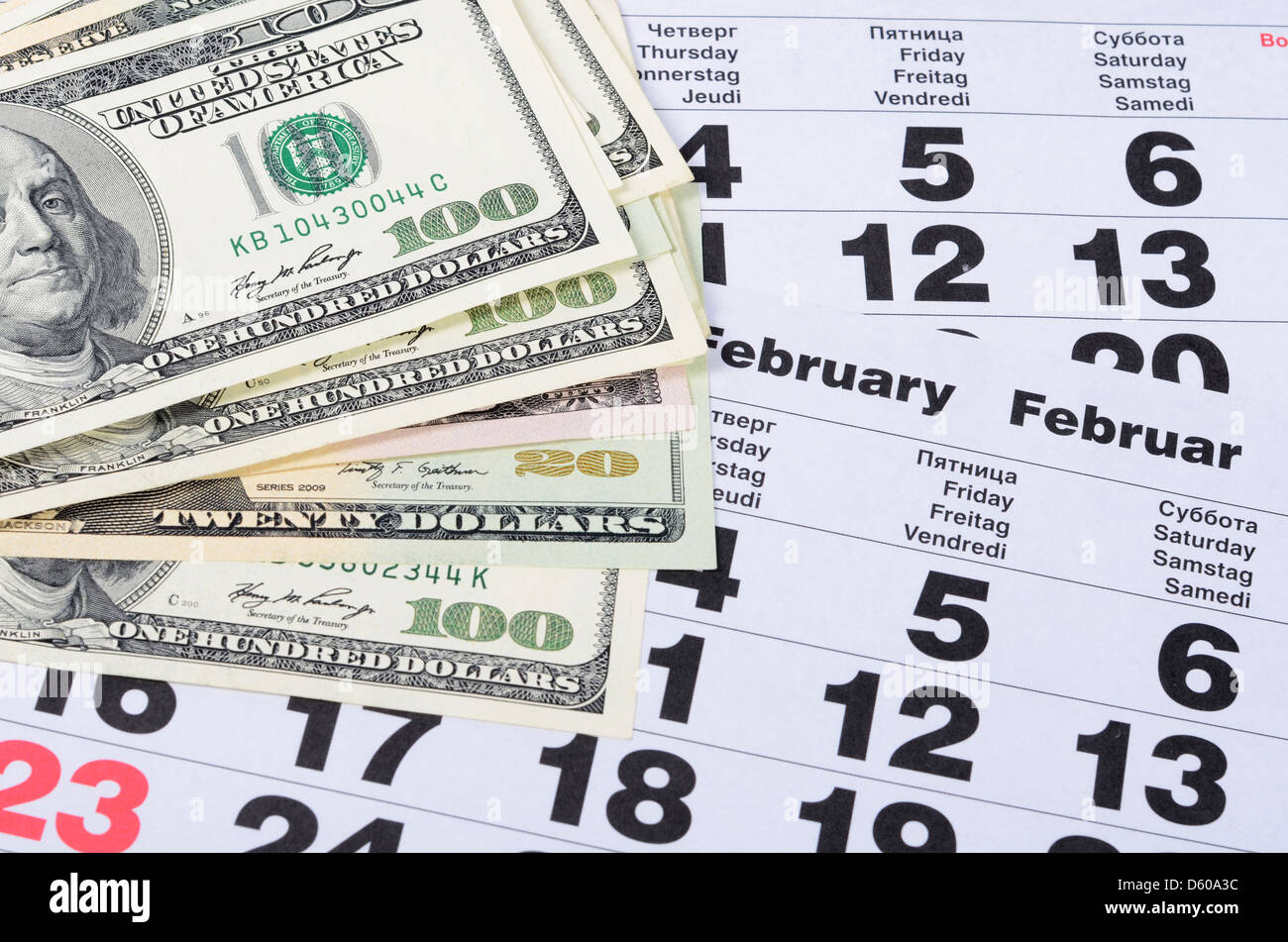 Banknotes of dollars on calendar sheets Stock Photo - Alamy